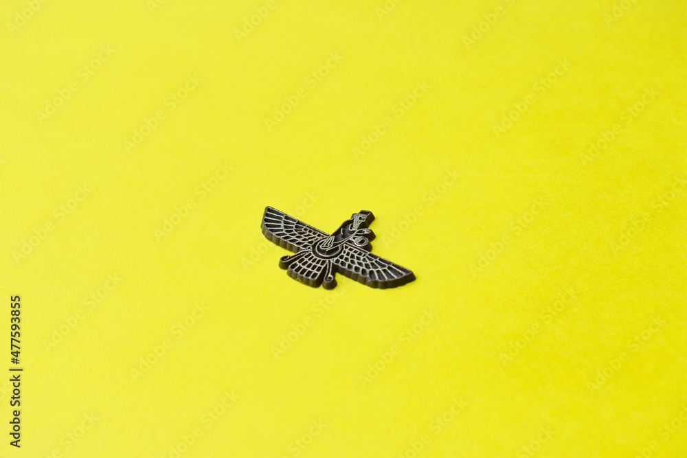 parsi holy symbol badge with yellow background Stock Photo | Adobe Stock
