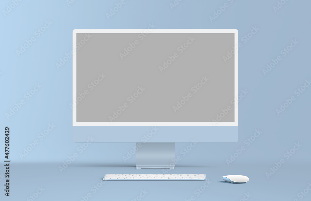 New blue desktop computer display with mouse and keyboard on blue ...