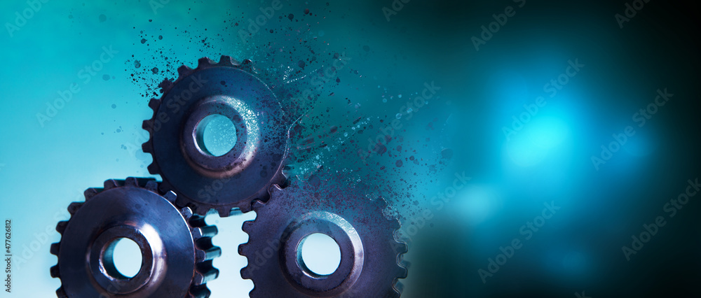gears disappear on a blue background Stock Photo | Adobe Stock