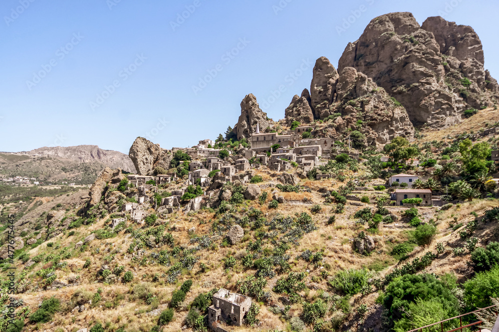 Small village of Pentedattilo, church and ruins of the abandoned ...