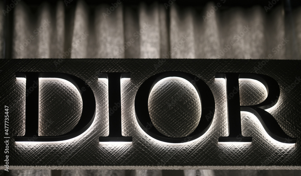 Dior logo displayed on a facade of a store in Milan. Stock Photo ...