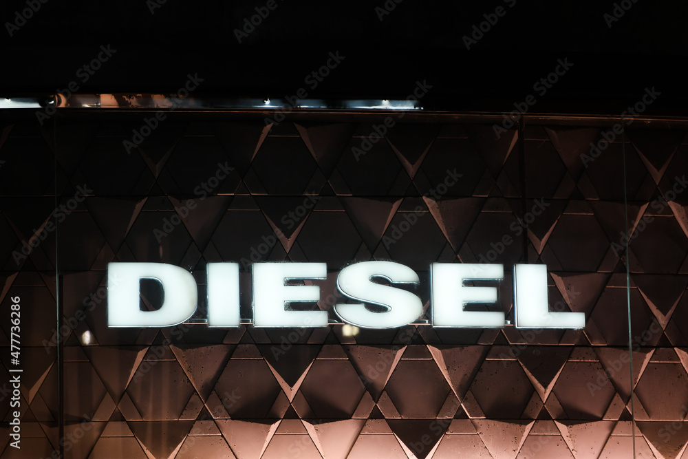 Diesel logo displayed on a facade of a store in Milan. Stock Photo ...