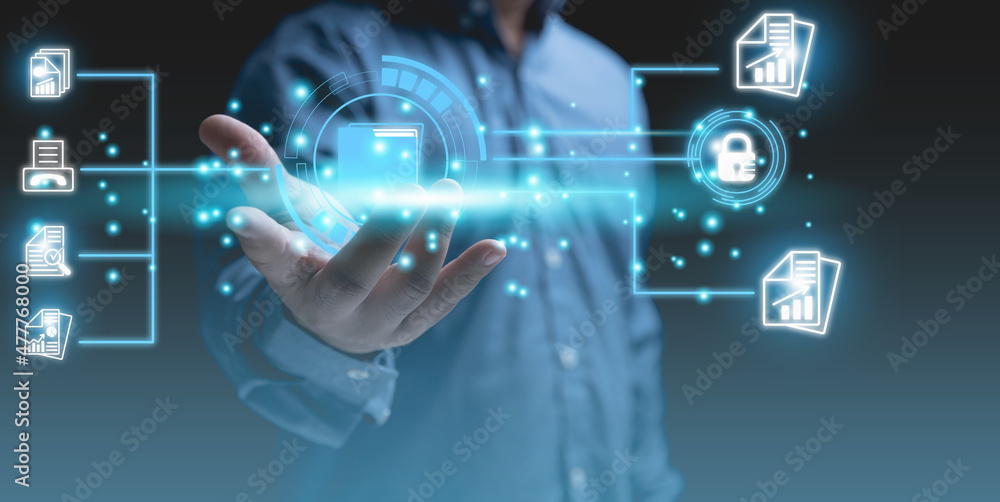 DOCUMENT MANAGEMENT SYSTEM. Businessman holding digital folder icon ...