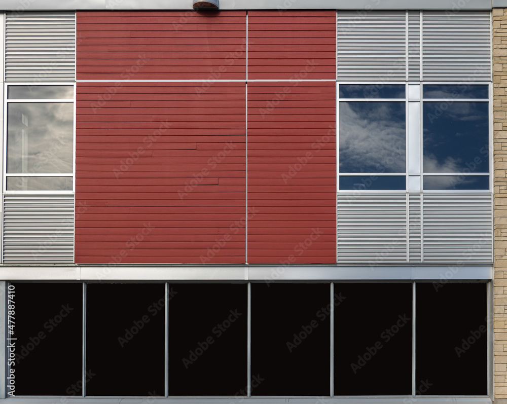 Front facade of a low rise commercial building in daytime showing ...
