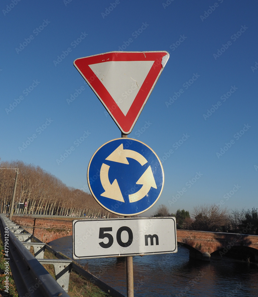 give way (yield) and roundabout sign Stock Photo | Adobe Stock