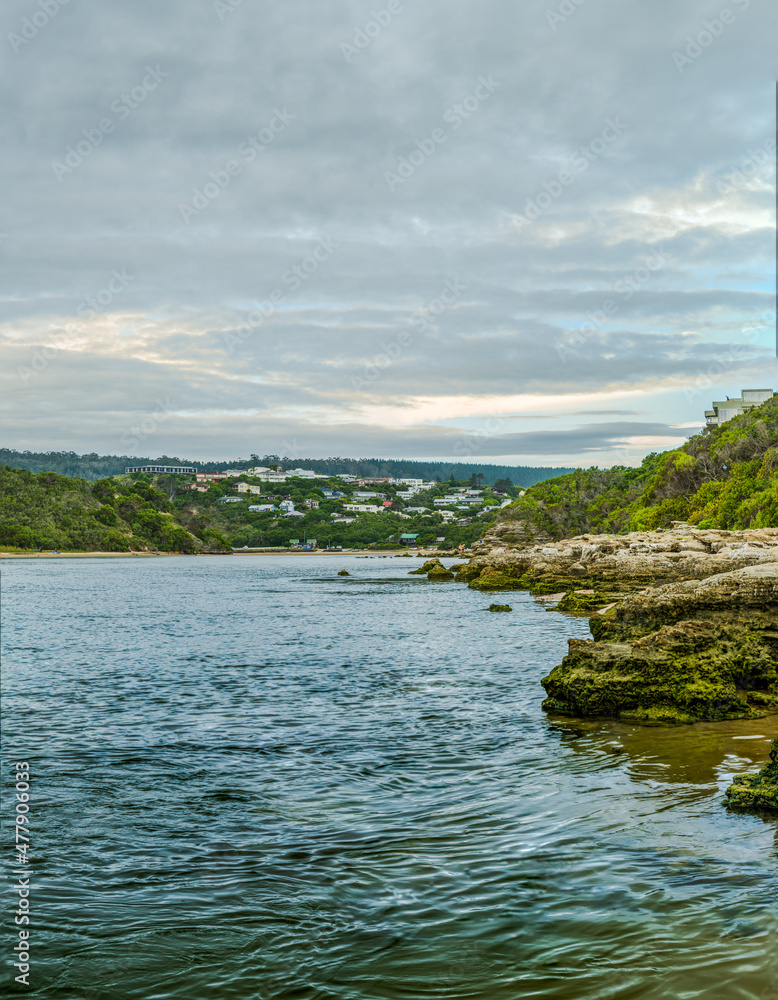 Sedgefield lagoon and the island town nestled on the mountain edge in ...