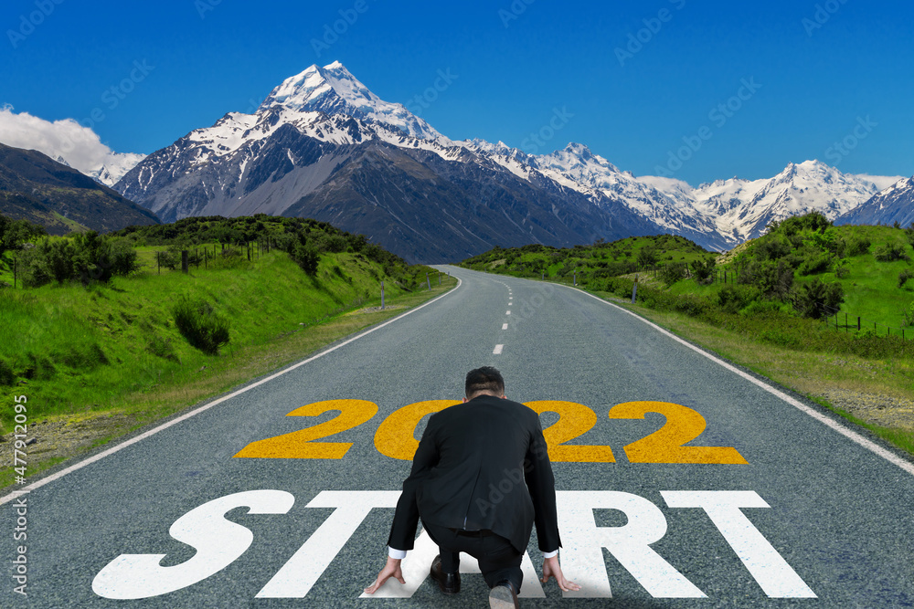 The 2022 New Year journey and future vision concept . Businessman ...