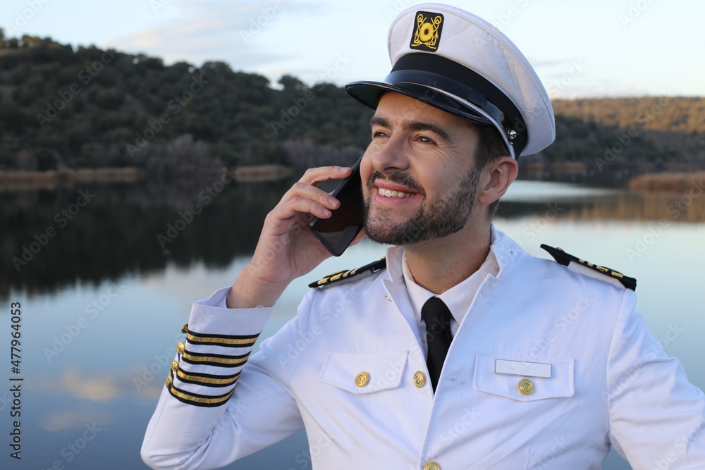 Ship captain making a phone call Stock Photo | Adobe Stock