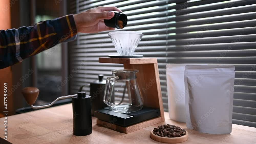 Close up hand drip coffee by Pour the ground coffee beans. into the ...