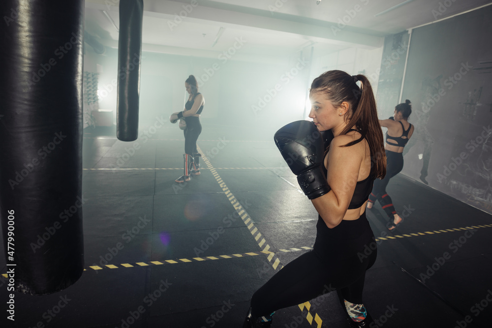 Boxer woman. Boxing fitness woman smiling happy wearing black boxing ...