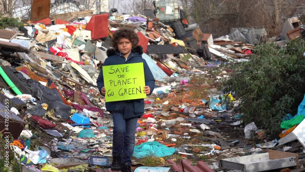 7-year-old child environmentalist and ecologist holding a sign with the ...