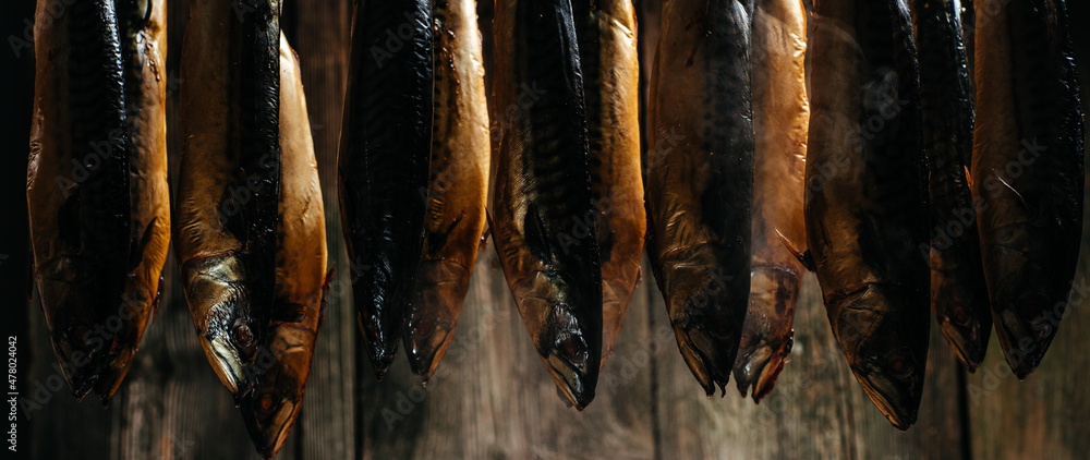 golden smoked fish. Process For Home Use. fish hanging side by side in ...