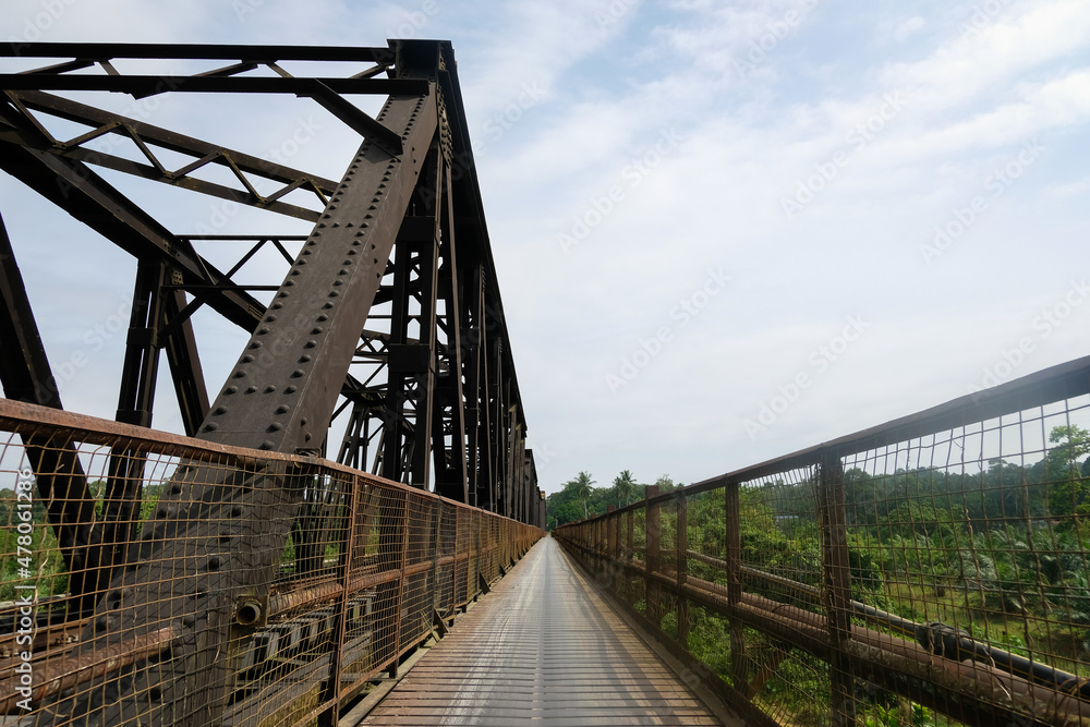 Pathway beside railway track bridge for motorcycle and pedestrian in ...