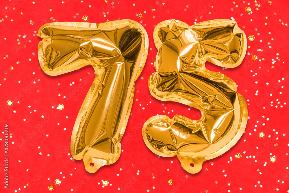 The number of the balloon made of golden foil, the number seventy-five ...