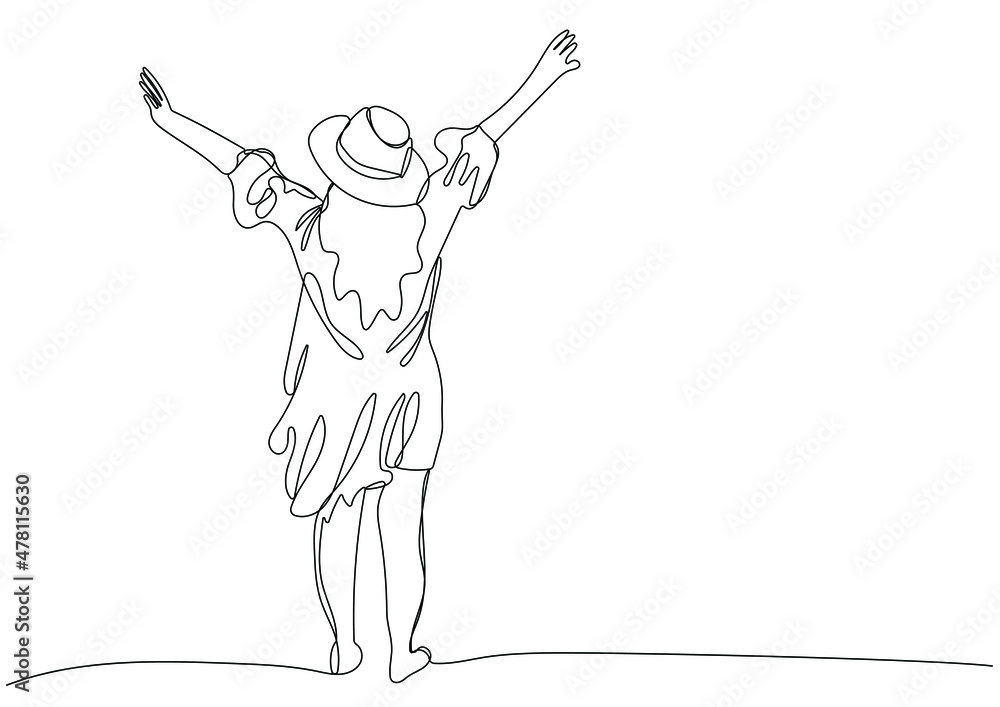 Happy woman in hat standing and stretching two hands towards sky ...