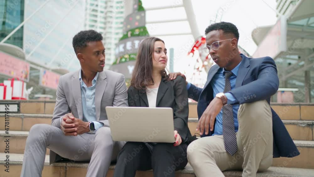 Group of sympathetic friends or business coworkers patting woman ...