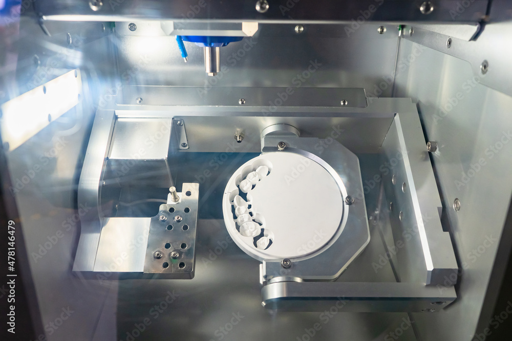 Dental equipment. Process cutting out temporary crowns. Milling machine ...