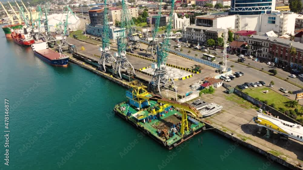 Container ship loading and unloading in deep sea port, Aerial view of ...