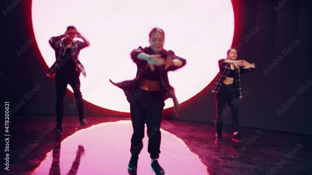 Diverse Group of Three Professional Dancers Performing a Hip Hop Dance ...