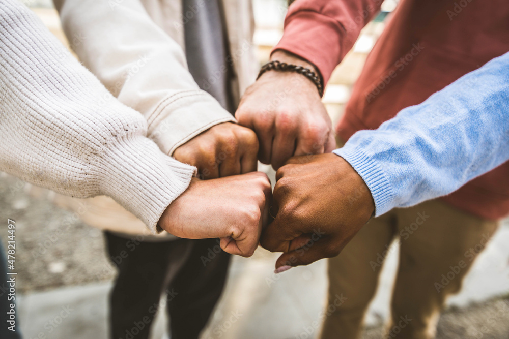 College students teamwork stacking hand together - Community group ...