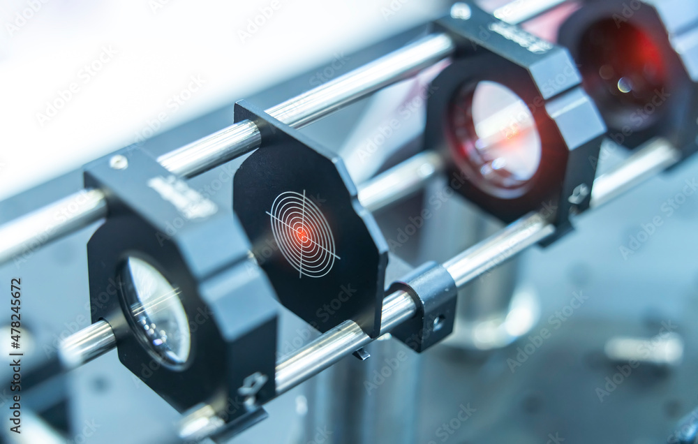 Experiment with laser device in optical laboratory Stock Photo | Adobe ...