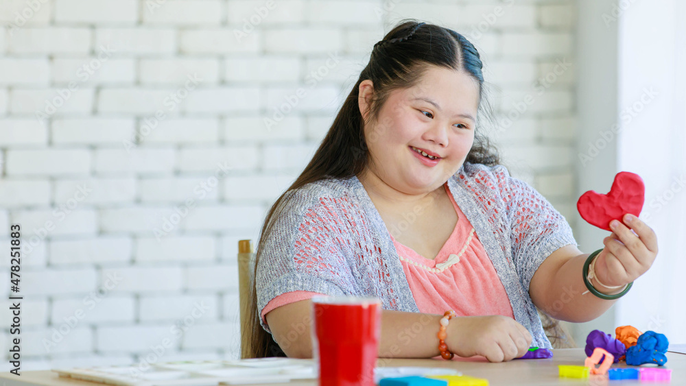 Asian young cute fun chubby down syndrome autistic female art artist ...