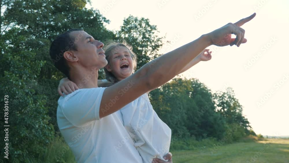 happy family. Dad and daughter spend time together in park. Happy ...