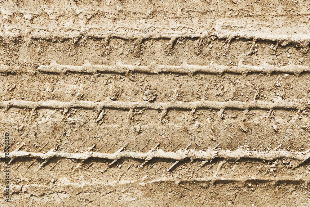 Sand tyre mark background. Tire track shape. Trail lines on dry brown ...