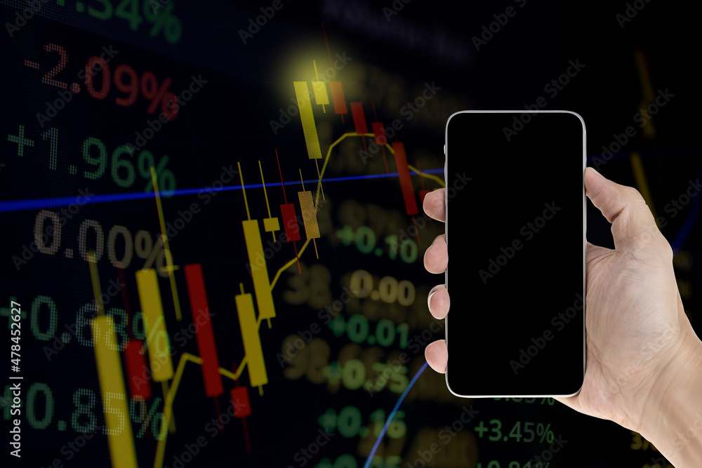 Man hand holding smartphone black blank screen on Stock market or forex ...