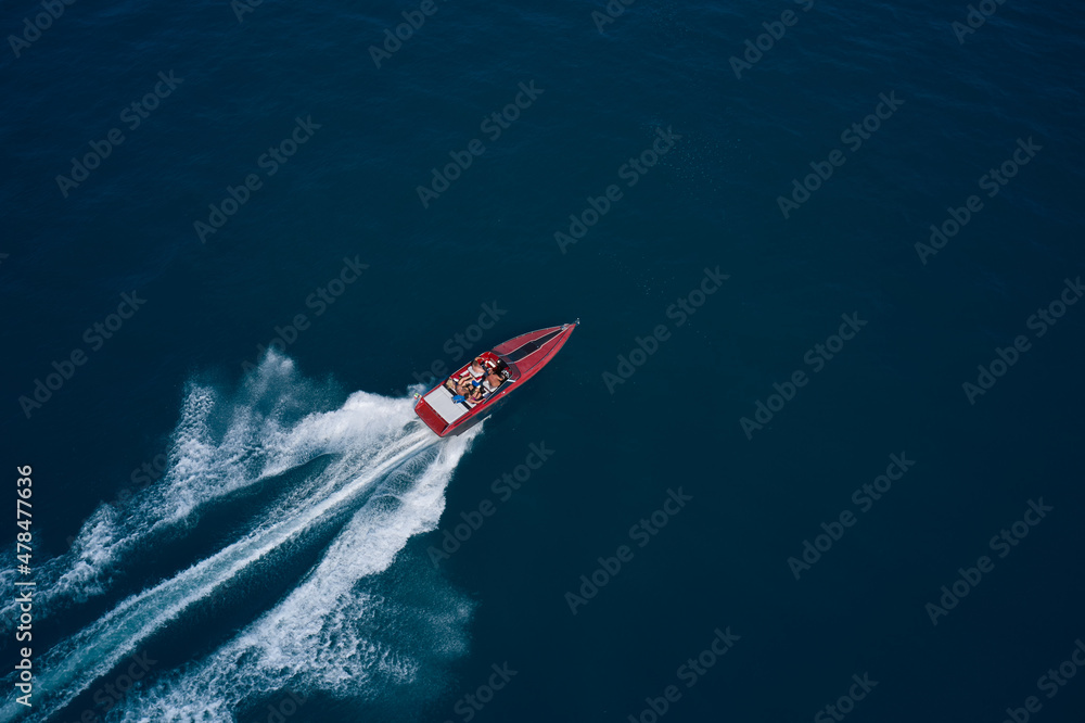 Red speed boat fast movement on the water top view. Travel - image. Top ...
