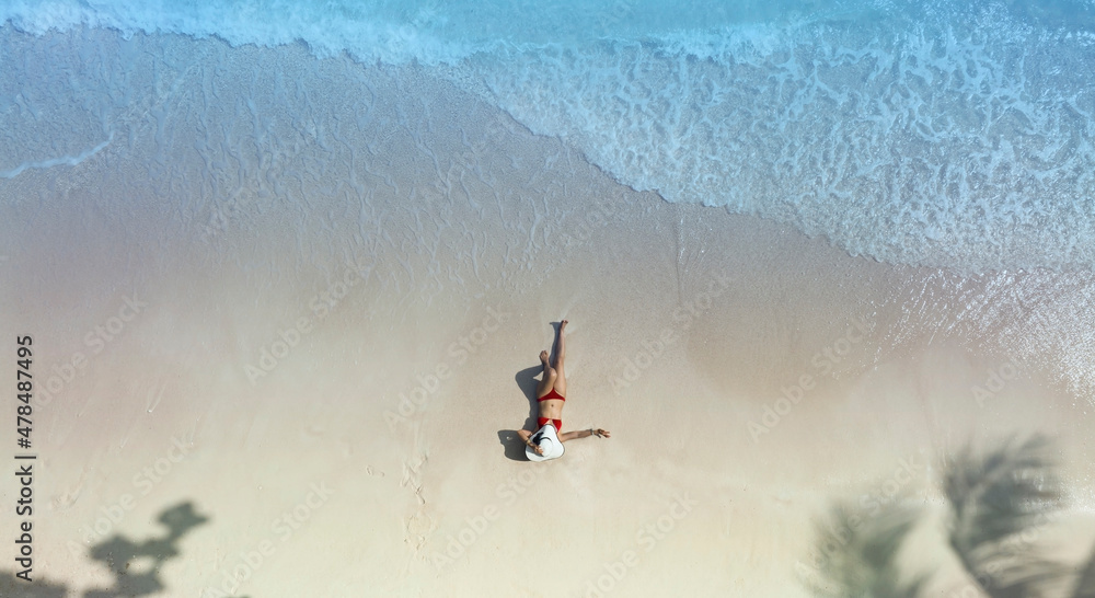 Top view of young woman sunbathing in red bikini freedom lifestyle and ...