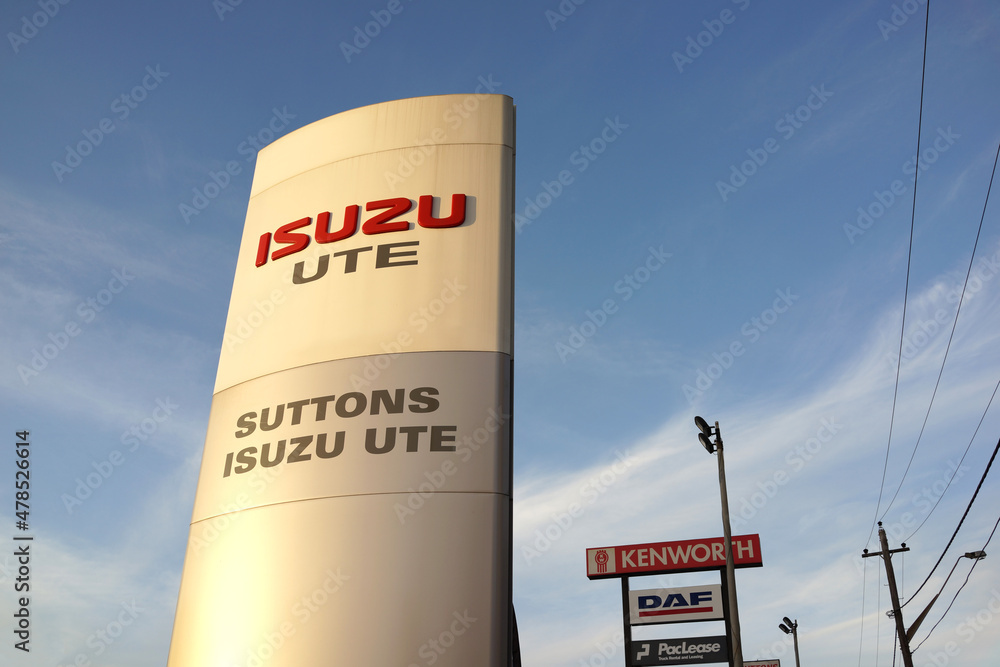 Isuzu care sign outside the sale and service center. Isuzu is a ...
