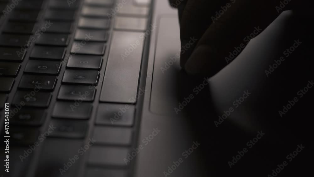 The Male Fingers Touch The Touchpad Of The Laptop. Working on a Laptop ...