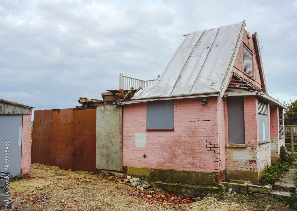 old abandoned building left in disrepair. Derelict house ready to be ...