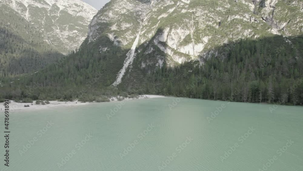 video with drone of plane view of bird receding over lago di landro ...