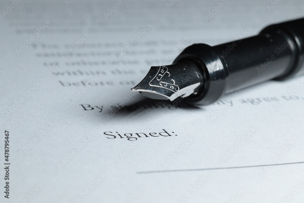 Fountain Pen placed next to signature blank Stock Photo | Adobe Stock