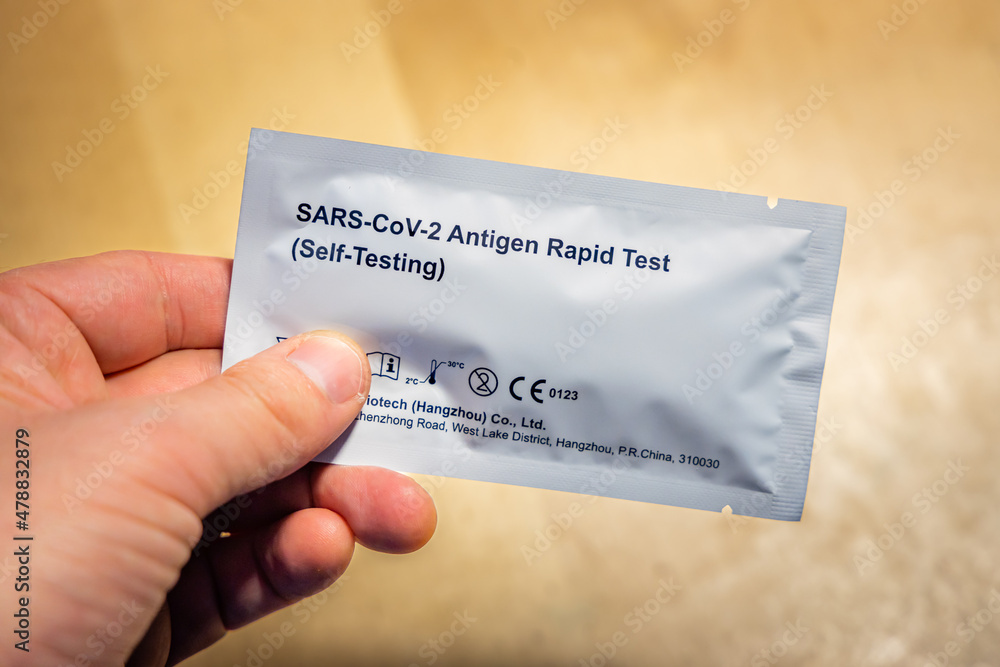 Hand holding a Sars-Cov-2 antigen rapid test, covid-19 auto test Stock ...