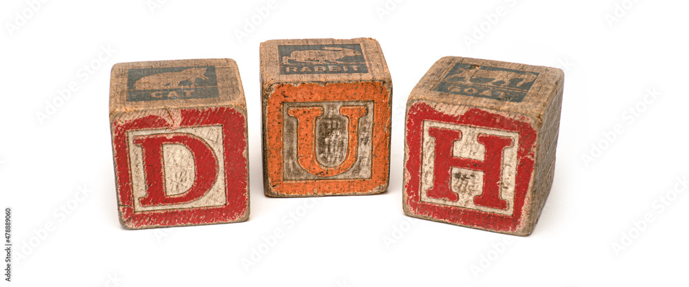 Vintage block letters spelling 'DUH' on white background Stock Photo ...
