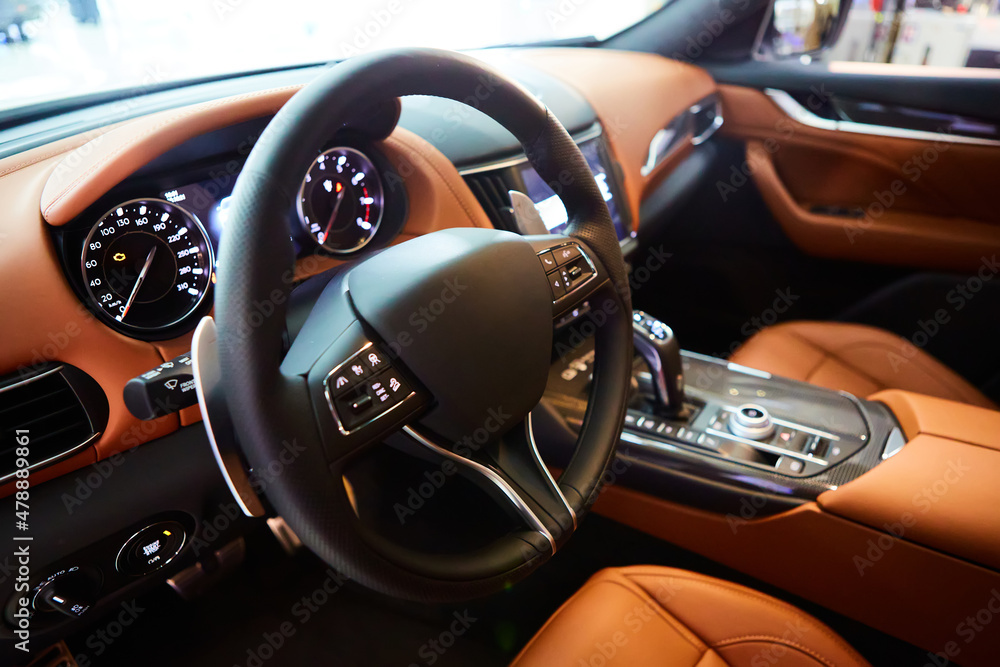 Car inside driver place. Interior of prestige modern car. Steering ...
