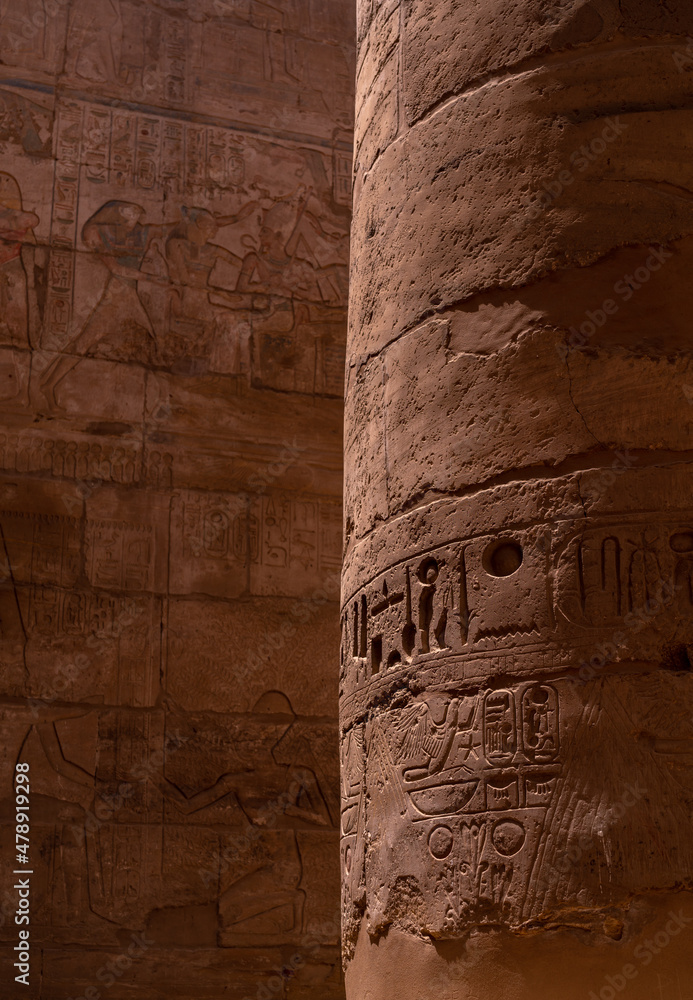Column covered with ancient Egyptian hieroglyphs. Stock Photo | Adobe Stock