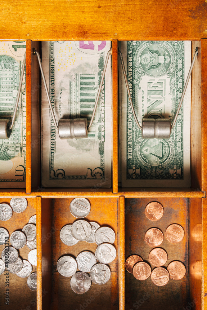 Money in cash register Stock Photo | Adobe Stock