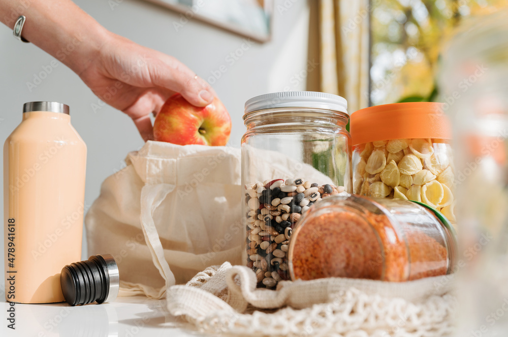 Unpacking Sustainably Packed Groceries Stock Photo | Adobe Stock