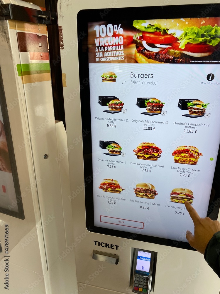 Barcelona, Spain, 2 January 2022: People using Self-ordering Kiosk at ...
