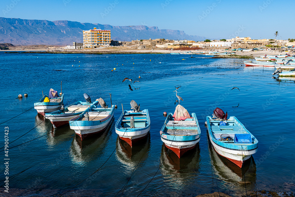 Fishing port of Mirbat with small fishing boats, Salalah Stock Photo ...
