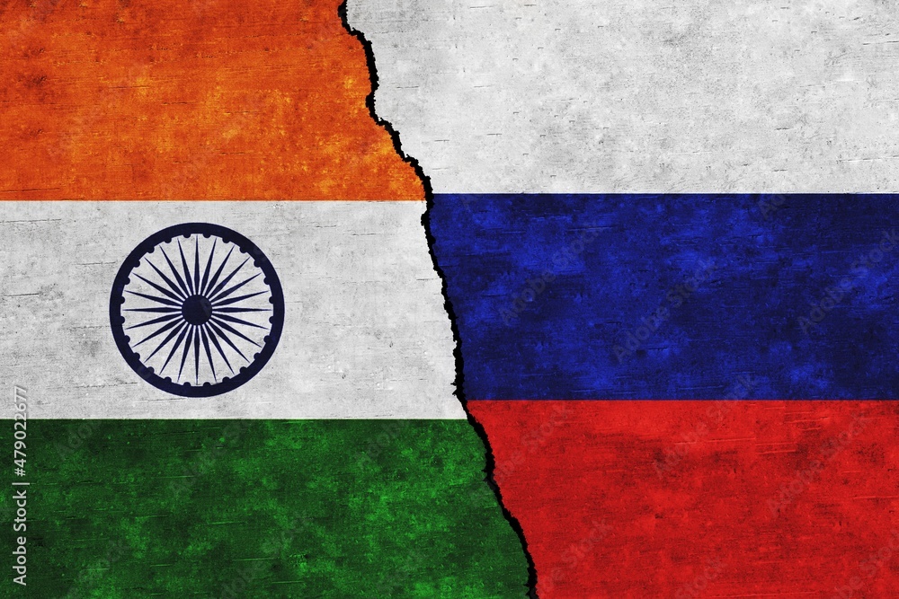Russia and India painted flags on a wall with a crack. Russia and India ...