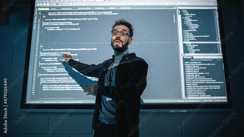 Teacher Giving Computer Science Lecture to Diverse Multiethnic Group of Female and Male Students ...