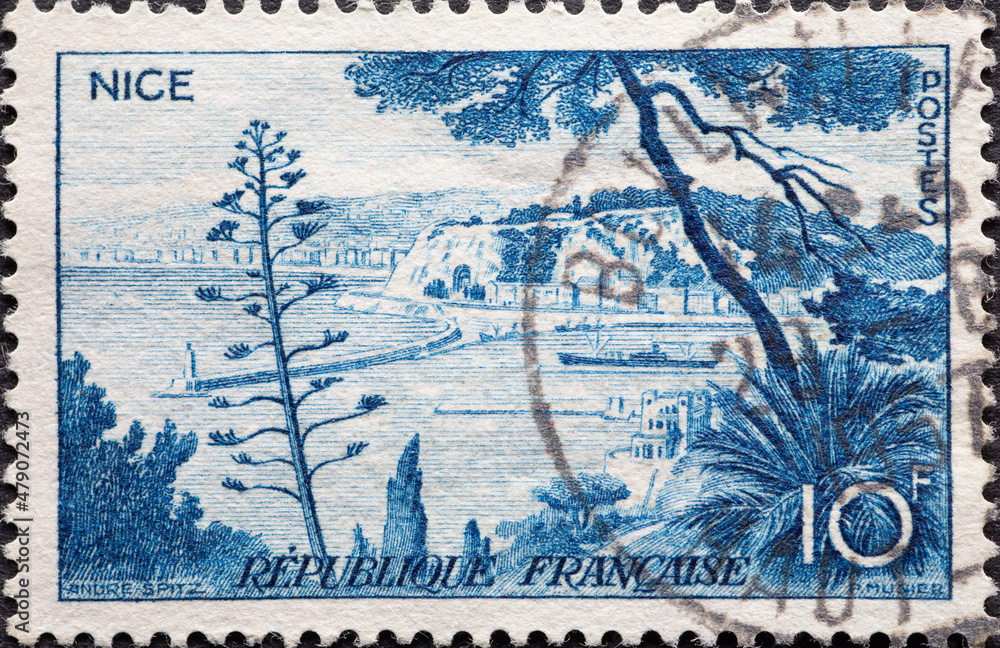 France - circa 1955: A post stamp from France showing an agave blossom ...