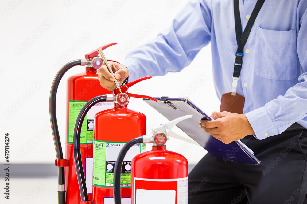 Fire extinguisher, Engineer inspection checking pressure gauge level ...