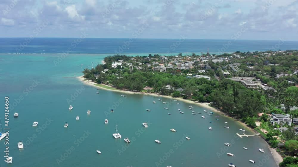 Aerial top view of ocean blue transparent water and moving motor white ...