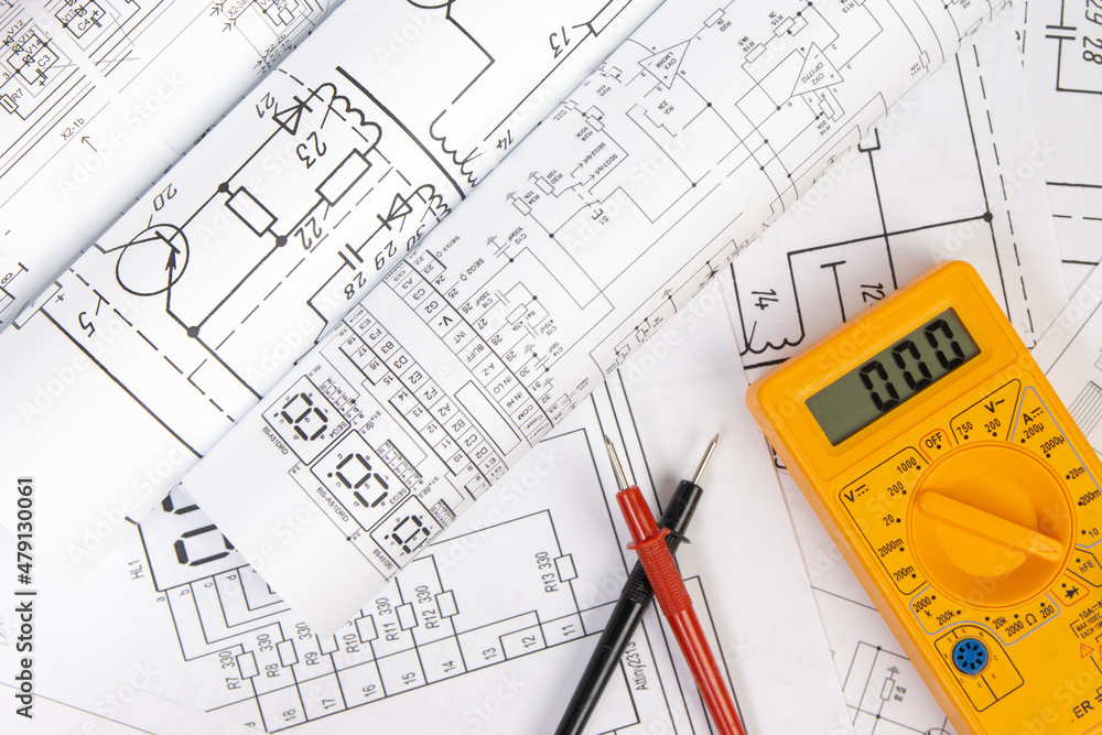 electrical engineering drawings and digital multimeter Stock Photo ...